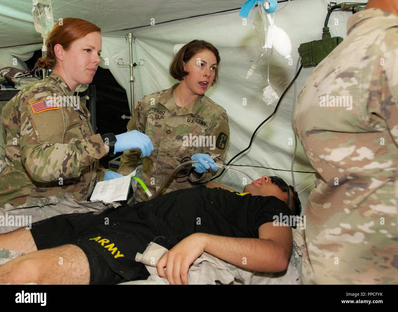 Maj. Laura Ogle (left), emergency medicine nurse, Walter Reed National ...