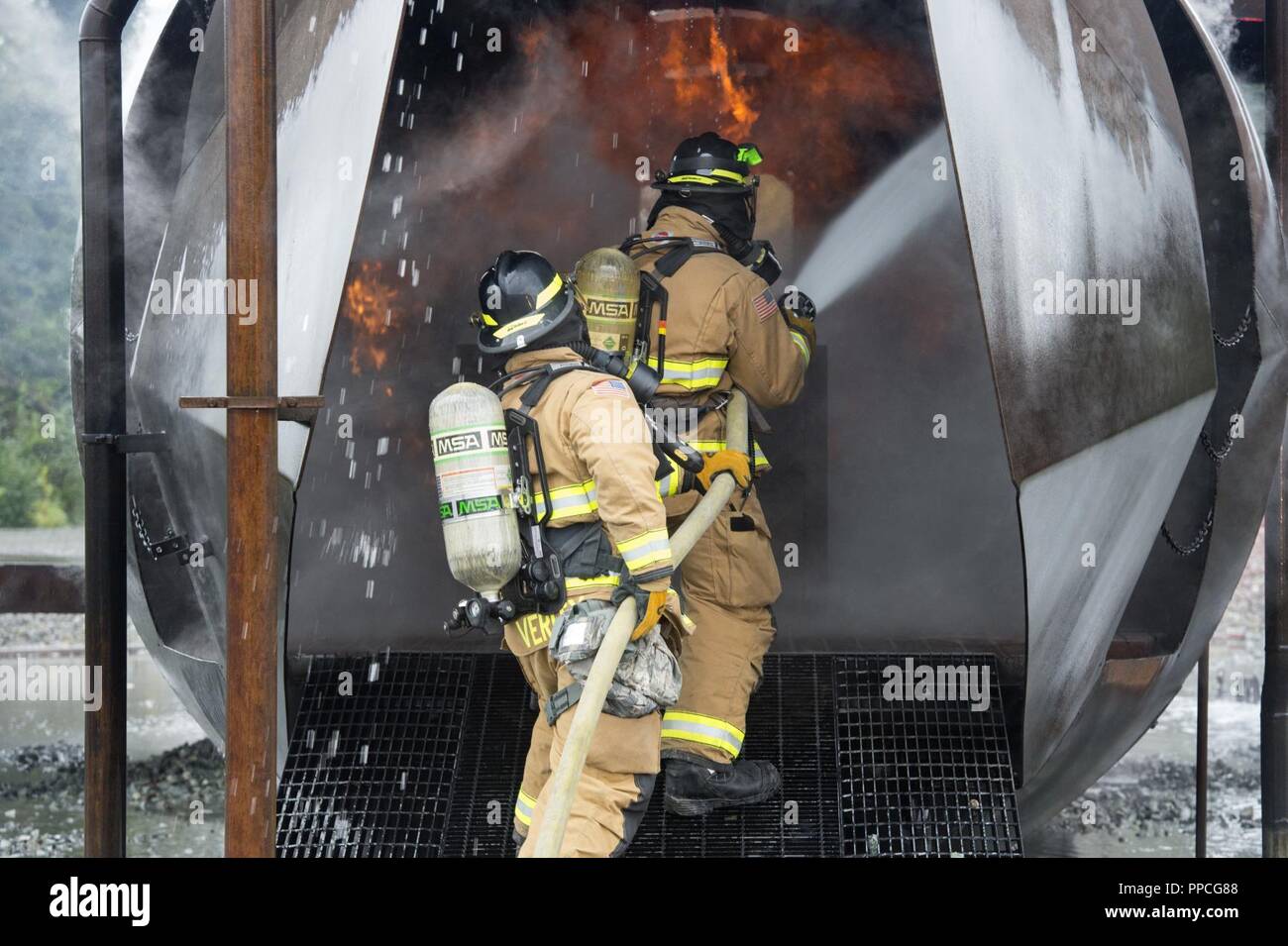 U.S. Air Force Airman 1st Class Collin Saumier, lead, and Staff Sgt ...