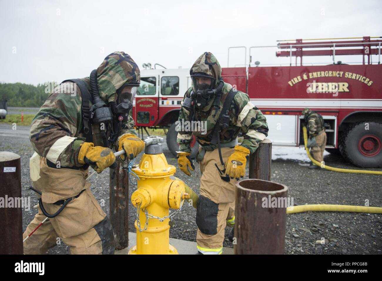 U.S. Air Force Airman 1st Class Collin Saumier, left, and Staff Sgt ...