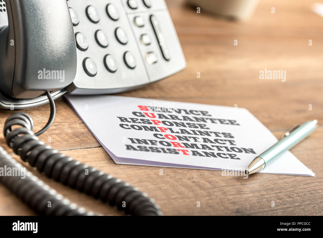 Close up Support Acronym in Business Concept on Top of a Wooden Table ...