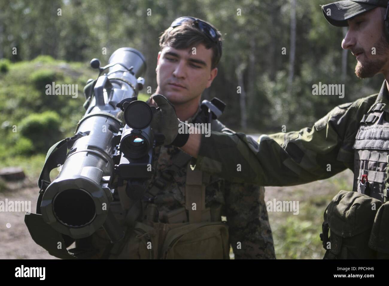 A U.S. Marine with Marine Rotational Force-Europe 18.1 inspects the ...