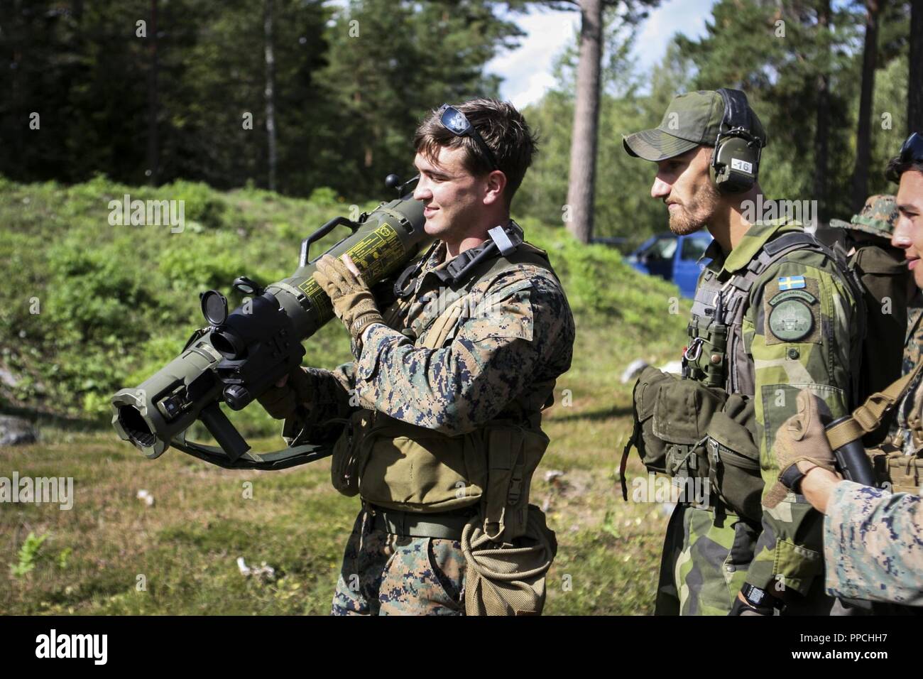 A U.S. Marine with Marine Rotational Force-Europe 18.1 inspects the ...