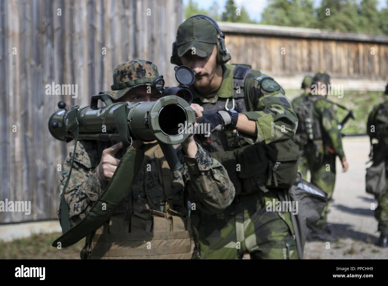 A U.S. Marine with Marine Rotational Force-Europe 18.1 inspects the ...