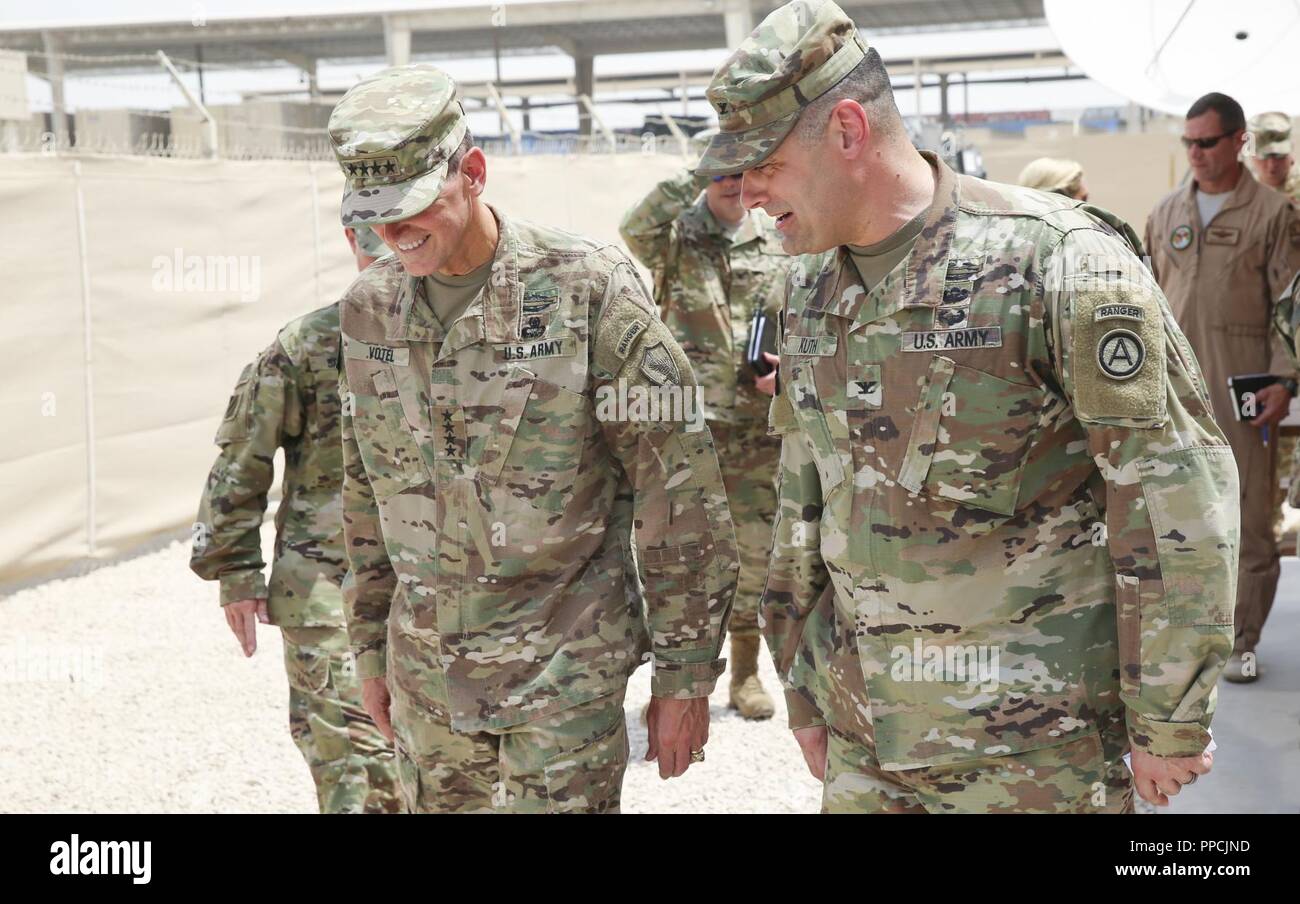 U.S. Army Gen. Joseph Votel, U.S. Central Command commander, shares a ...