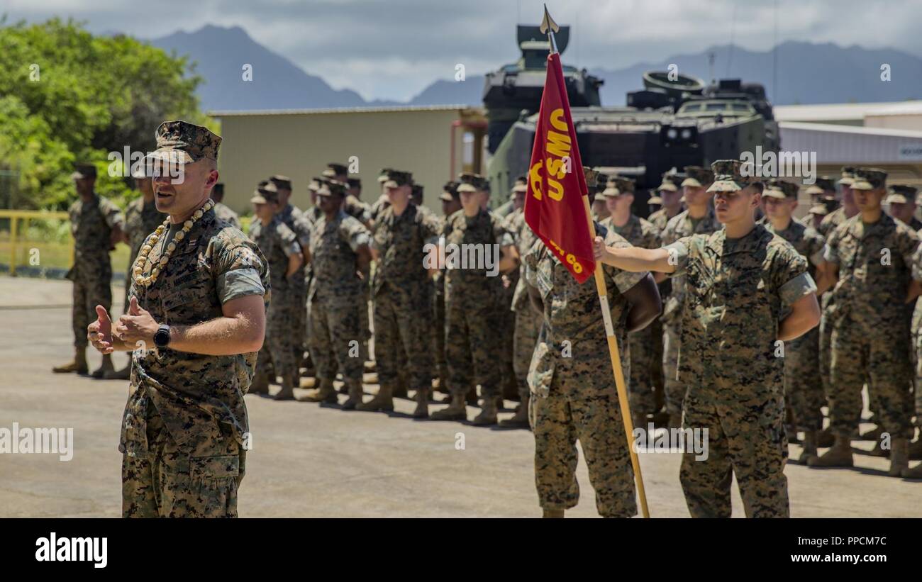 U.S. Marine Corps Capt. Ryan Holland, oncoming commanding officer ...