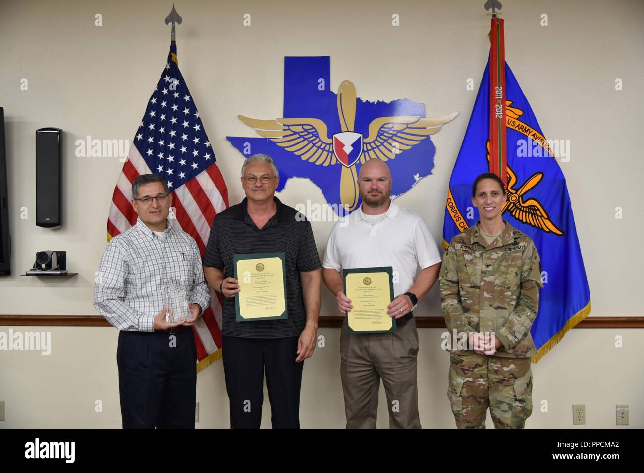 (From left to right) Corpus Christi Army Depot employees, Victor Lopez ...