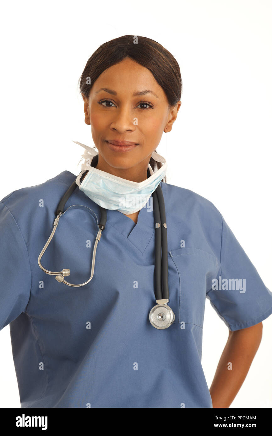 Young millennial black medical doctor dressed in scrubs on white ...