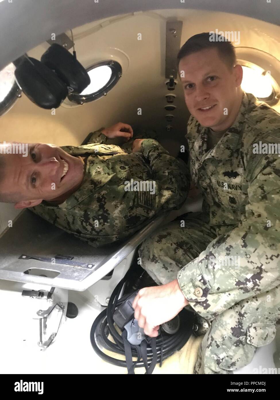 U.S. Navy Builder First Class Justin Lieder, assigned to Underwater ...