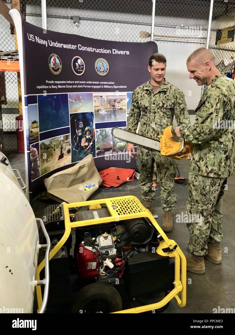 U.S. Navy Construction Mechanic Third Class Lucas Jackson, assigned to ...