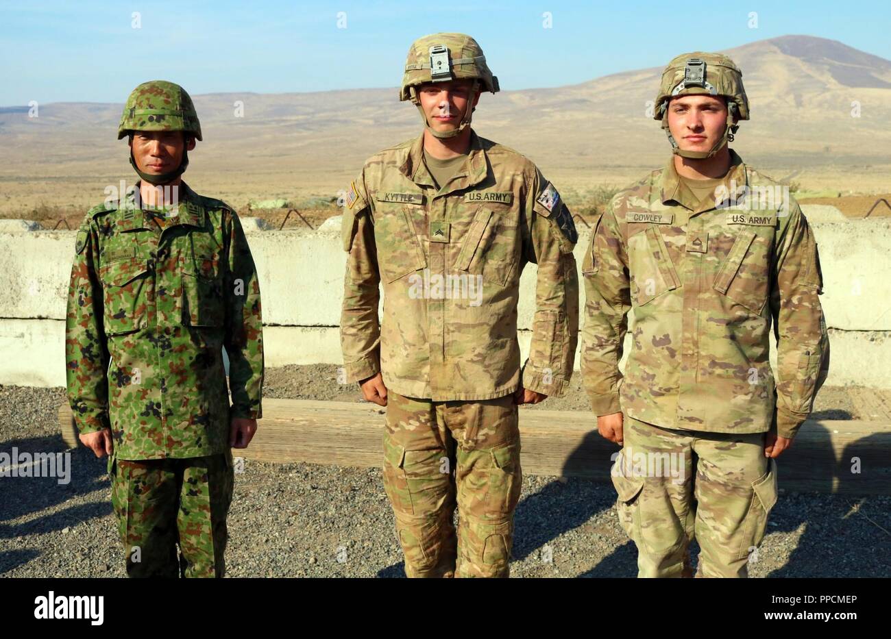 Cpl. Thomas Kyttle, sniper spotter, and Pfc. Edward Cowley, sniper ...