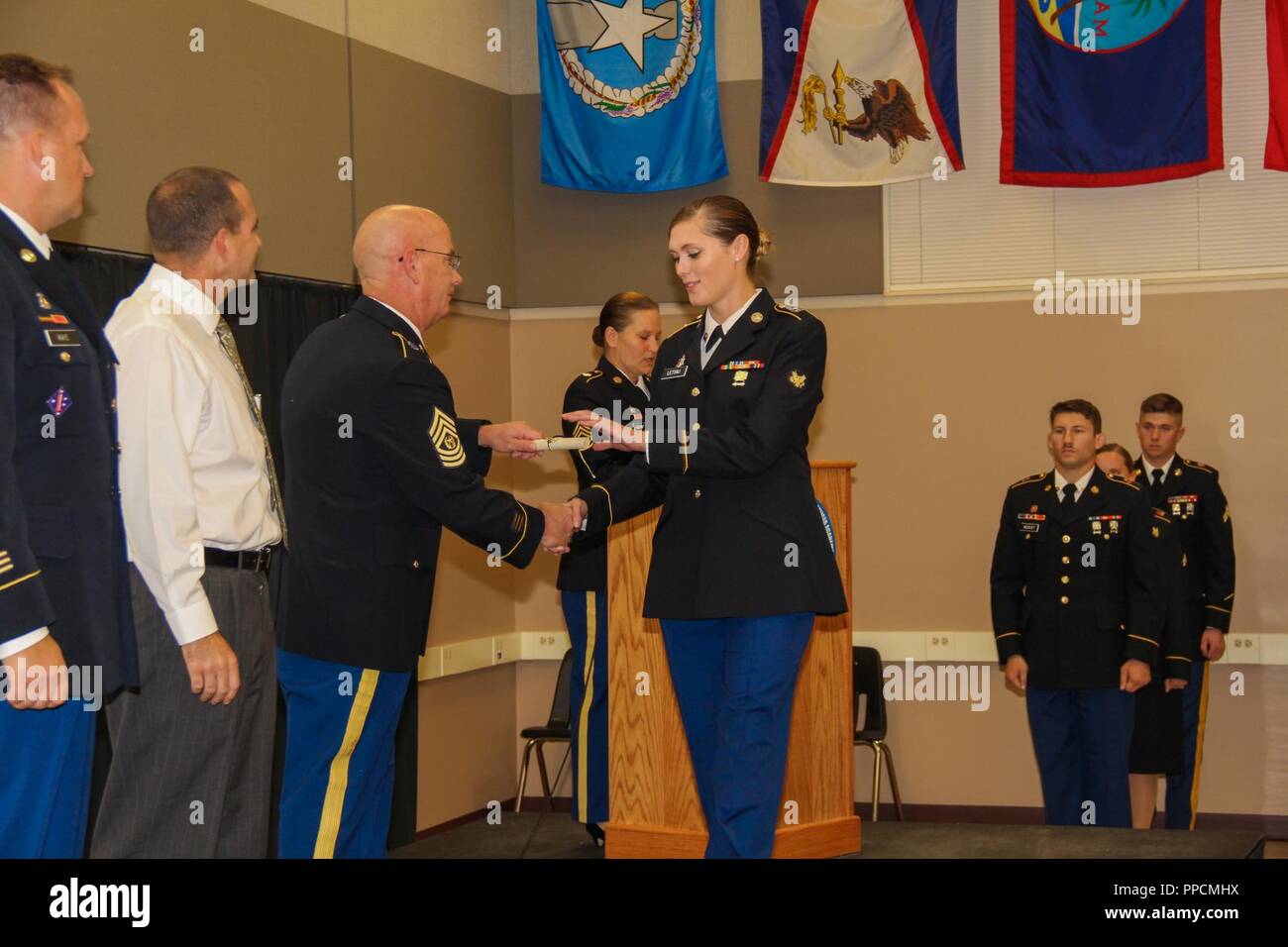 CSM Goodrich handing graduation certificate to BLC student Stock Photo ...