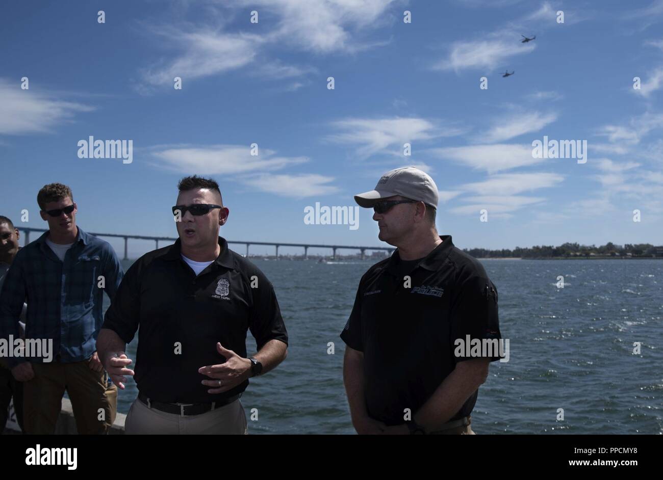 Lt. Col. Jason Ruffin (left), commander of the 393rd Military Police ...