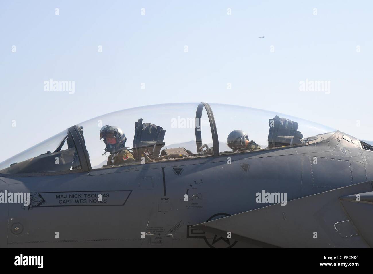Maj. Nick Tsougas and Capt. Wes Noyes, 389th Fighter Squadron, return ...