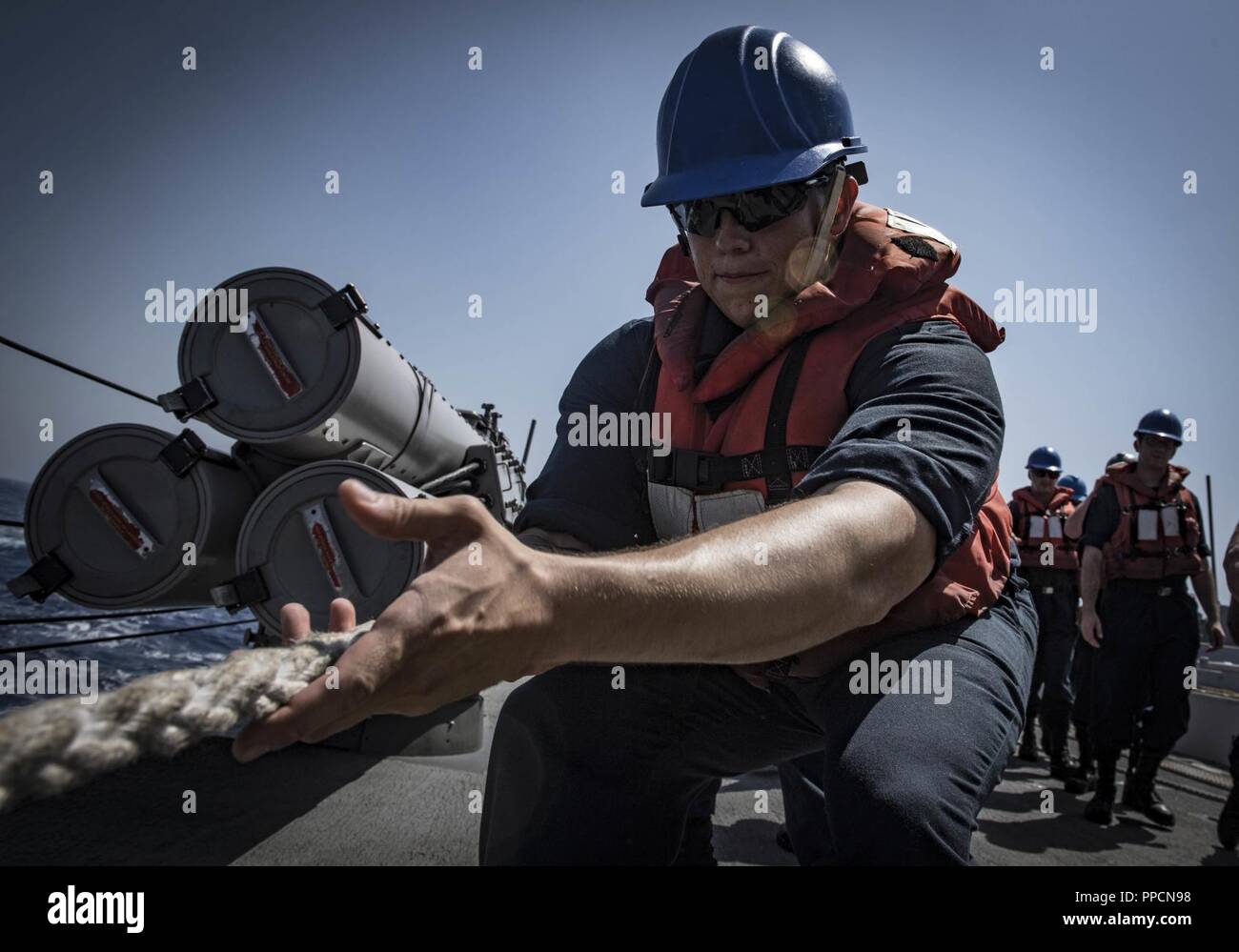 SEA (Sept. 3, 2018) Gunner’s Mate Seaman Jordan Kennedy heaves line ...