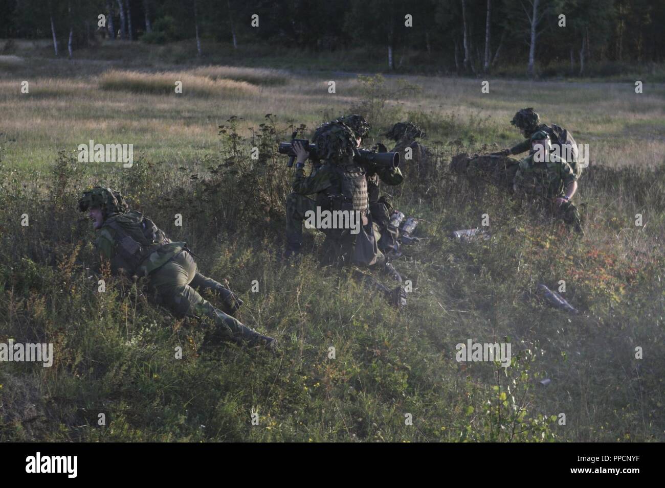 Swedish Marines with 1st Marine Regiment demonstrate the Swedish Carl ...