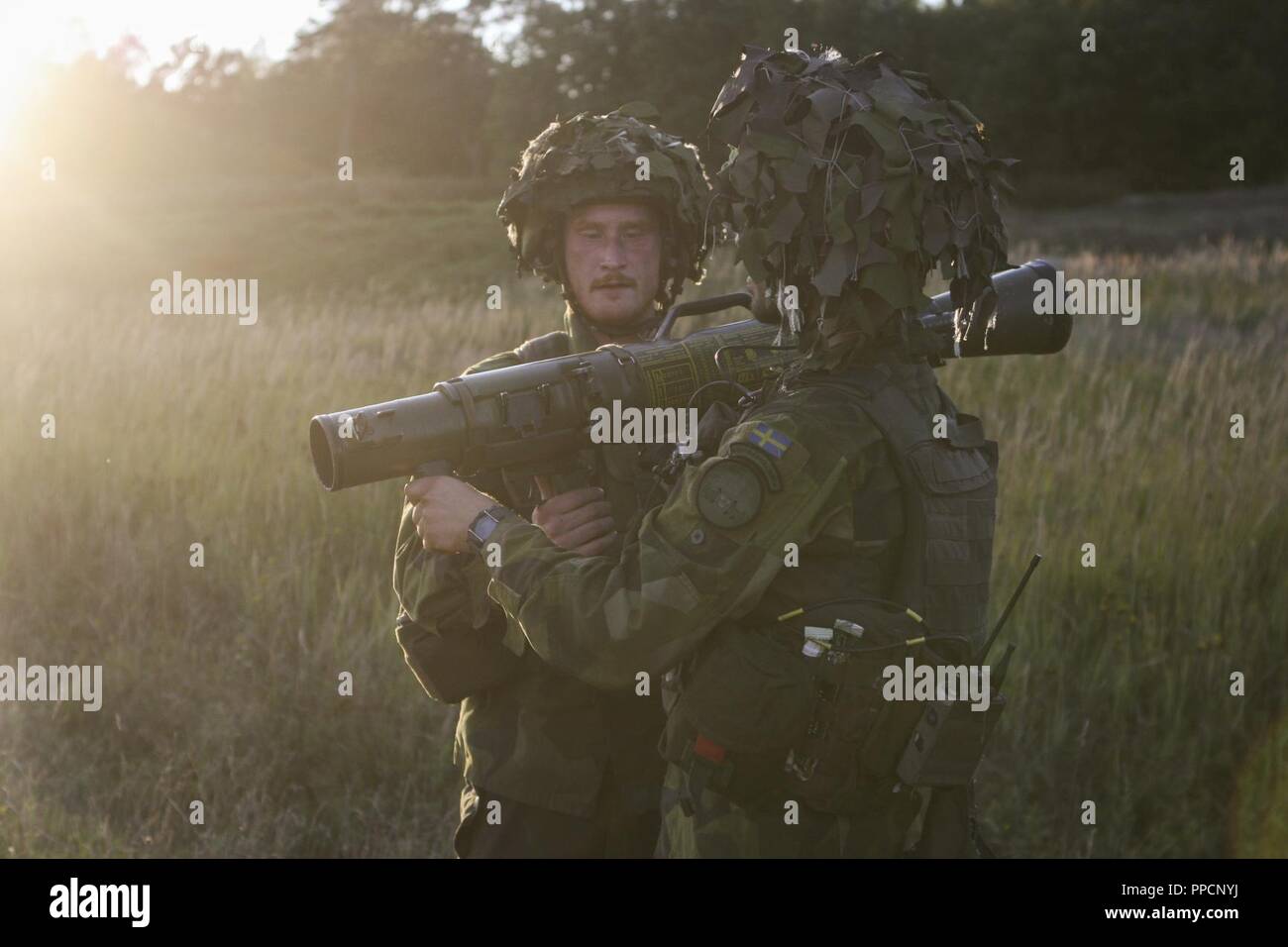Swedish Marines with 1st Marine Regiment demonstrate the Swedish Carl ...