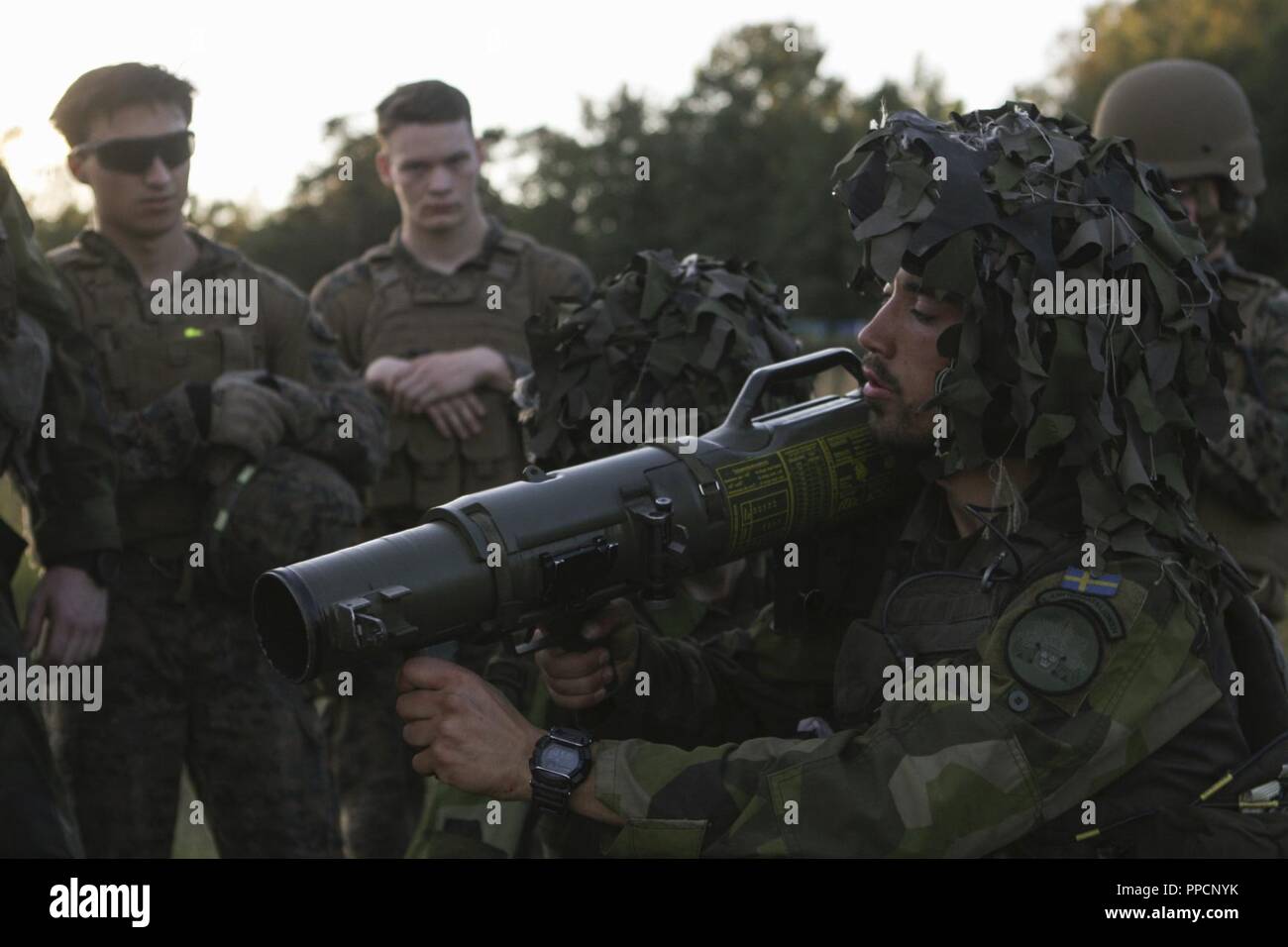 Swedish Marines with 1st Marine Regiment demonstrate the Swedish Carl ...