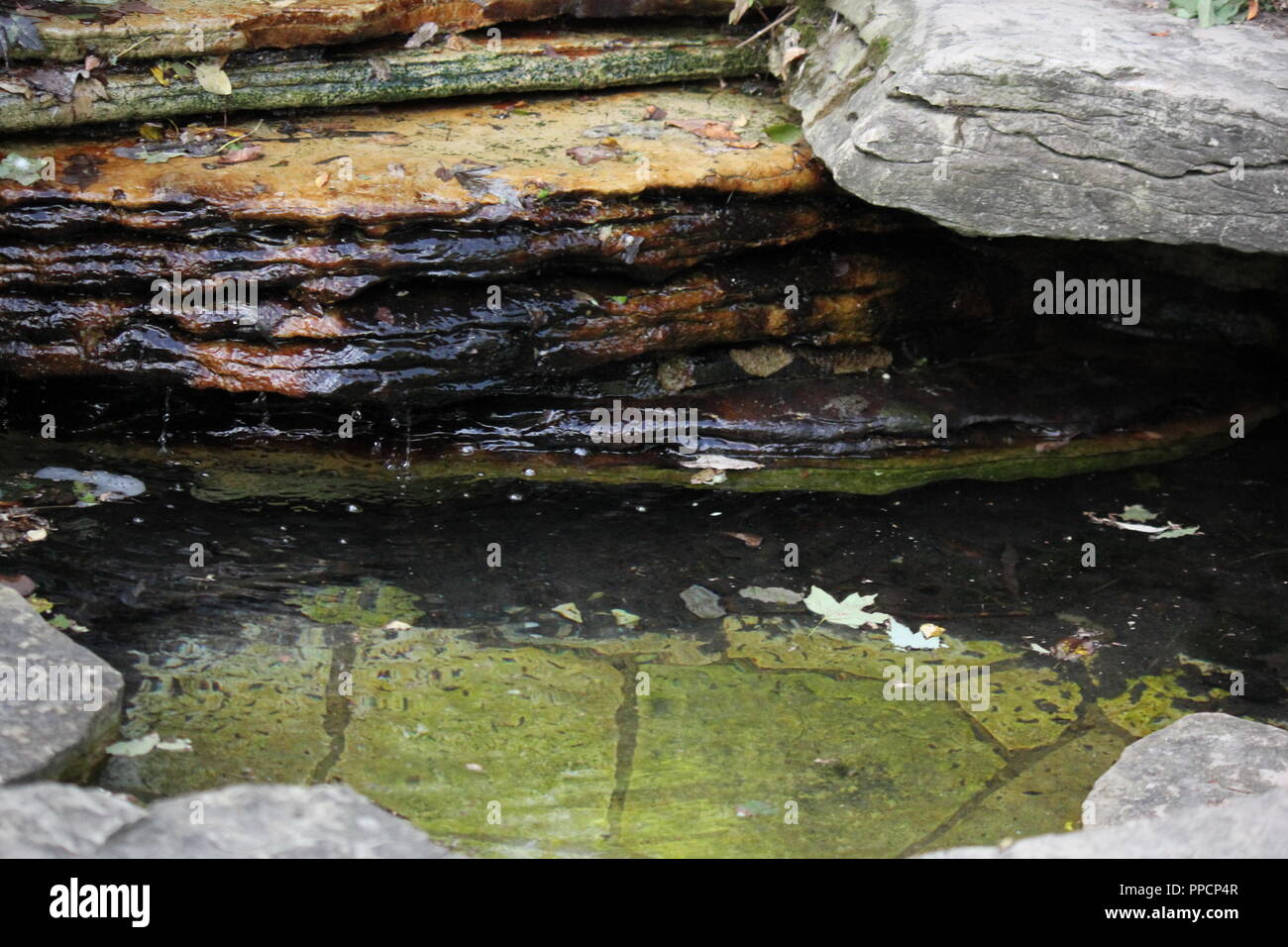 The stacked rocks and waterfall on a beautiful fall day Stock Photo - Alamy