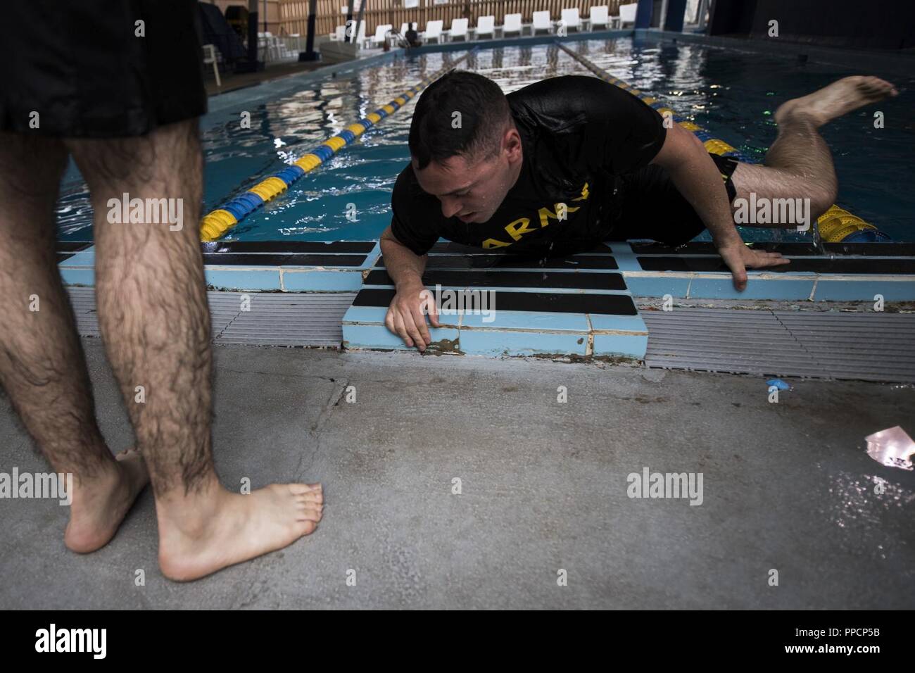 A U.S. Army Soldier assigned to the 10th Mountain Division, completes ...