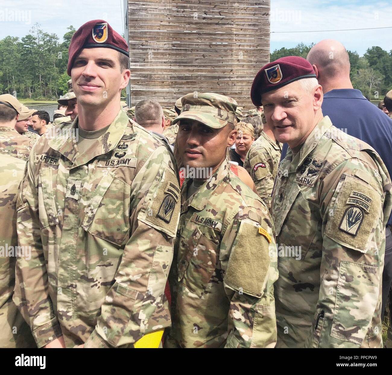 Attending the graduation ceremony for Spc. Ali Rezai (center), are ...