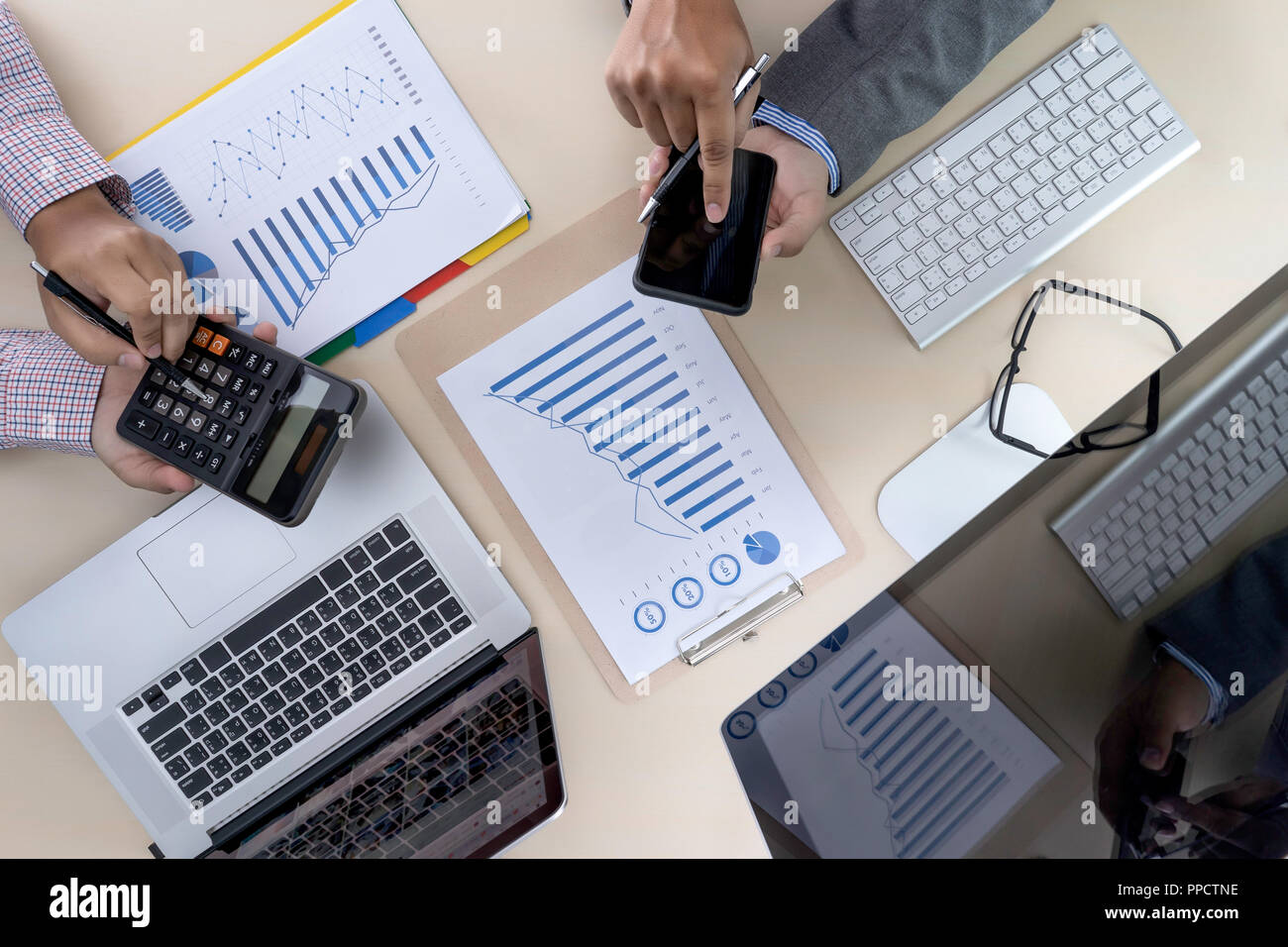 analyzing the work Accounting on Laptop investment concept Stock Photo ...