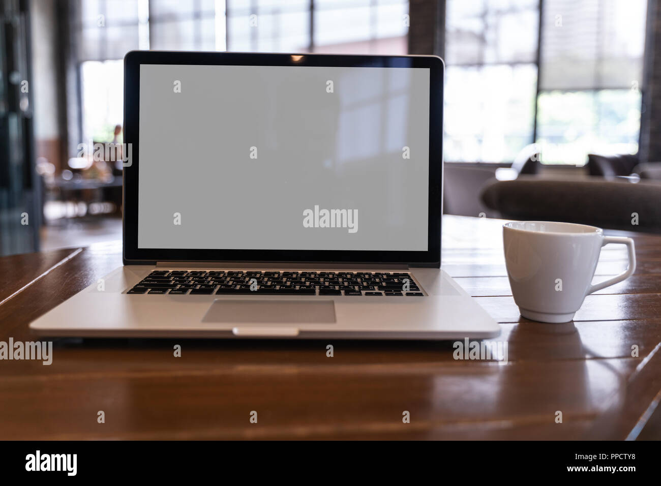 mock up Using laptop with blank screen computer modern Stock Photo - Alamy