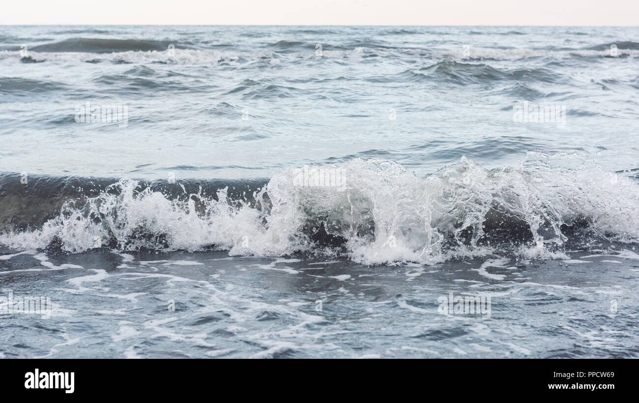 Sea wave splash Stock Photo - Alamy