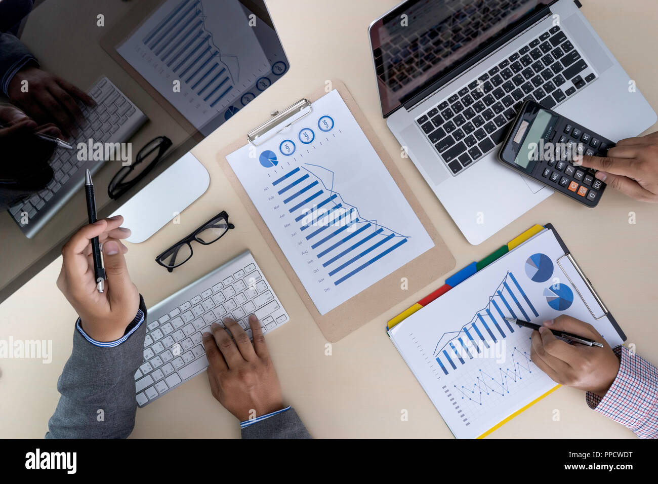 analyzing the work Accounting on Laptop investment concept Stock Photo ...