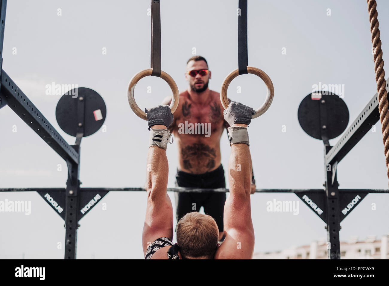Gymnastics rings strength hanging hi-res stock photography and images ...