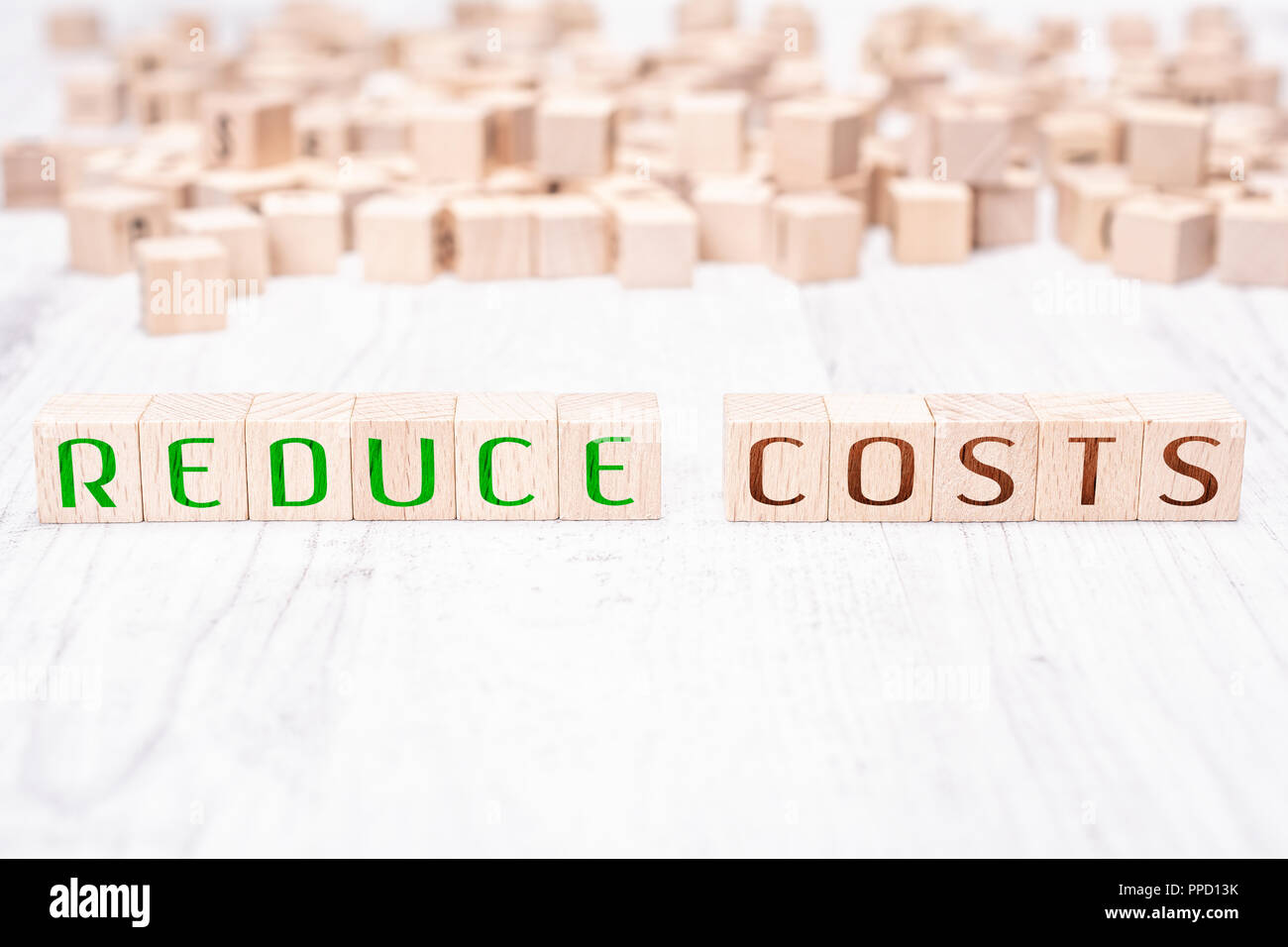 Reduce costs hi-res stock photography and images - Alamy