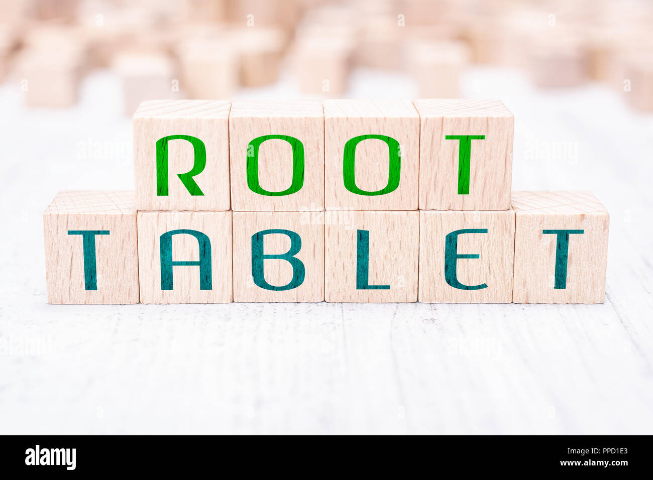 The Words Root Tablet Formed By Wooden Blocks On A White Table Stock ...