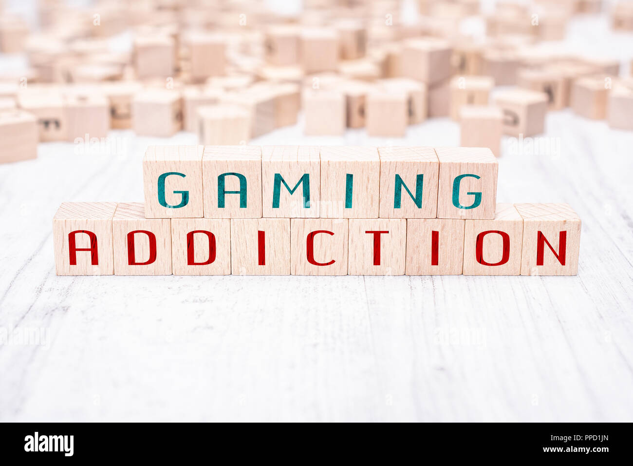 The Words Gaming Addiction Formed By Wooden Blocks On A White Table ...