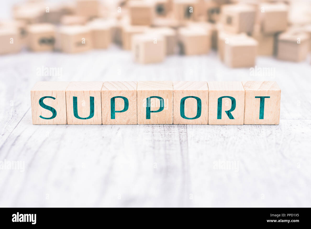 The Word Support Formed By Wooden Blocks On A White Table Stock Photo ...