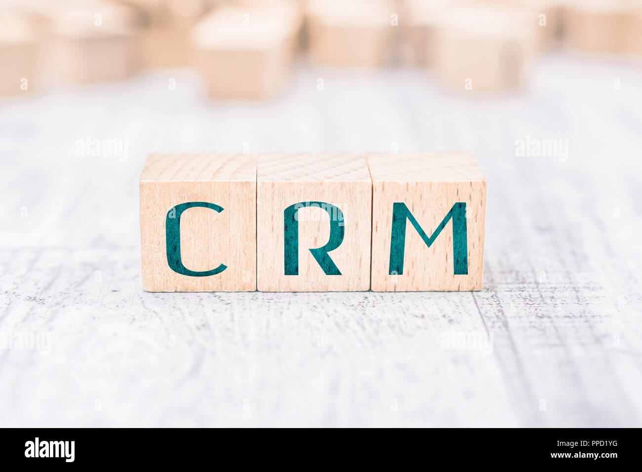 The Abbreviation CRM Formed By Wooden Blocks On A White Table Stock ...