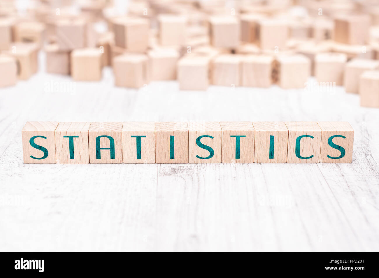 The Word Statistics Formed By Wooden Blocks On A White Table Stock ...
