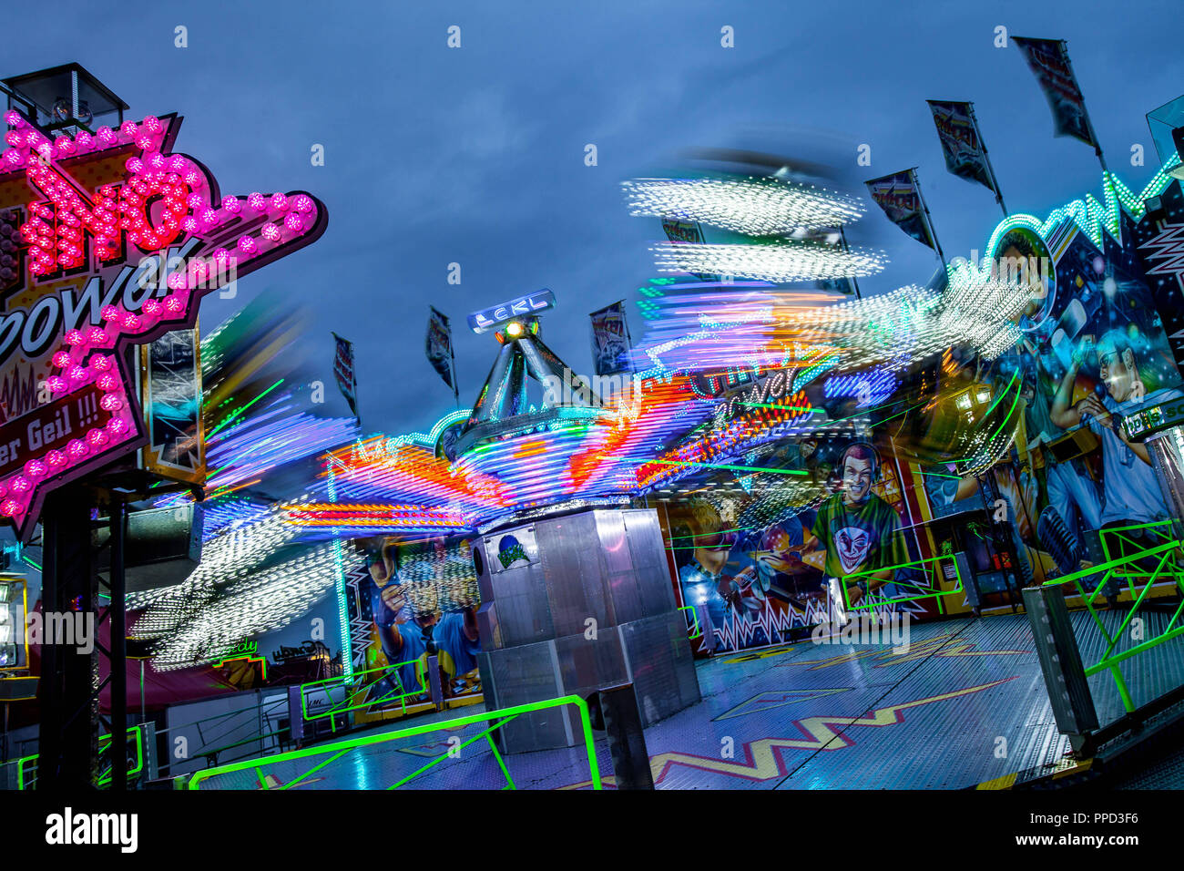 "TechnoPower" ride at the Spring Festival on Theresienwiese Stock Photo ...