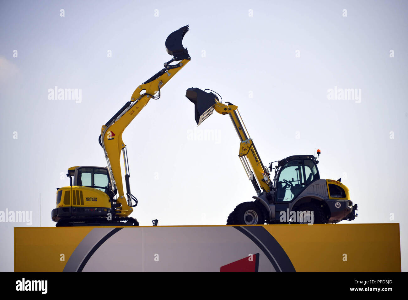 Exhibitors at the construction machinery fair "Bauma 2016" on the ...