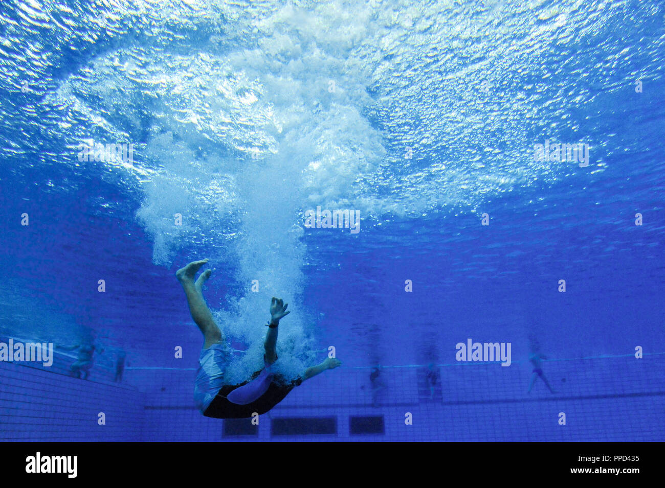 Indoor swimming pool with diving board hi-res stock photography and ...