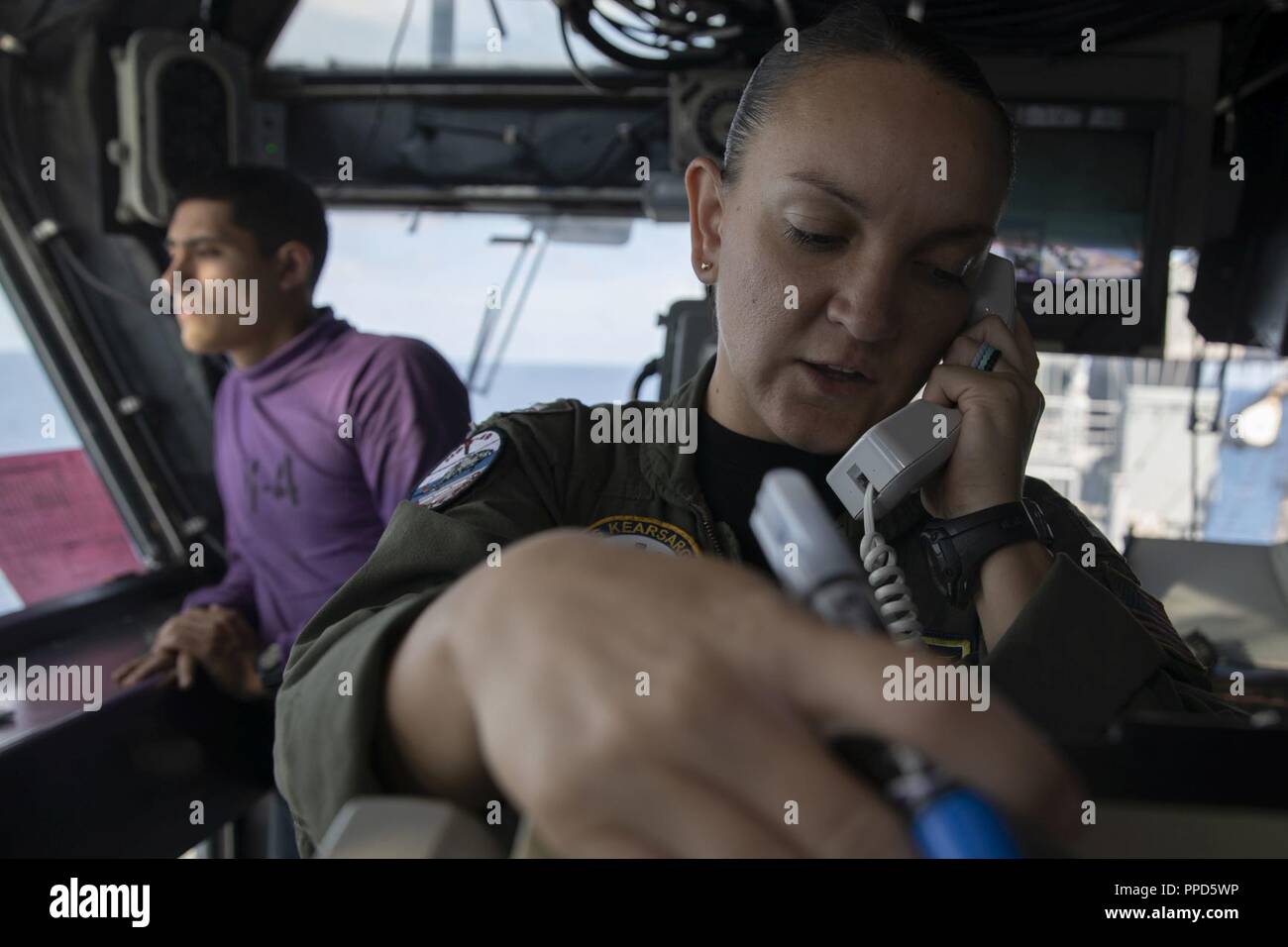 ATLANTIC OCEAN (Sept. 4, 2018) Lt. Leah Blaine communicates with ...