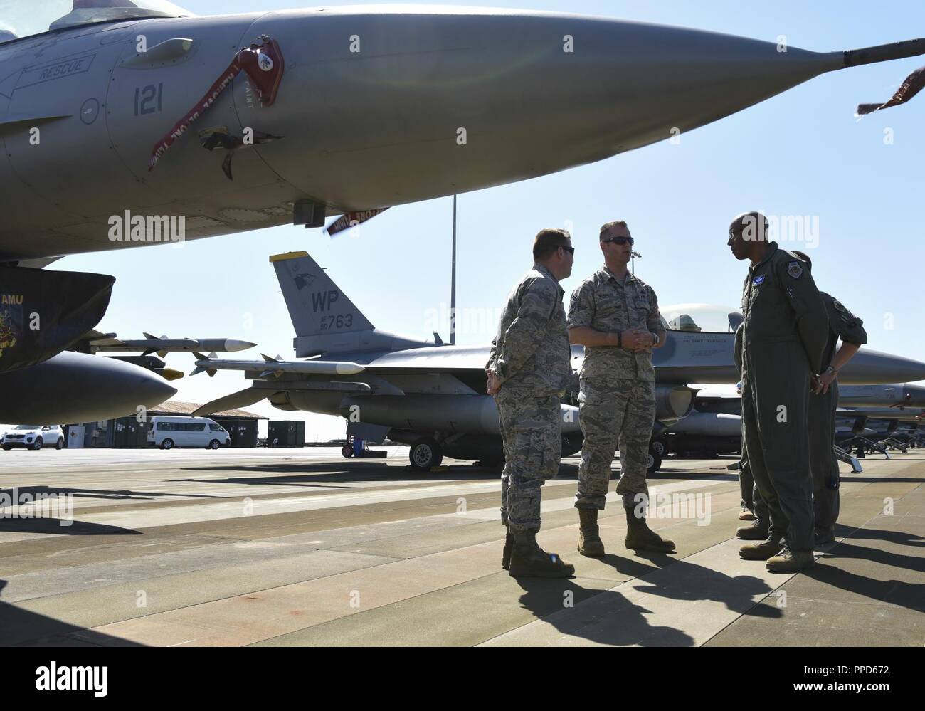 U.S. Air Force Gen. CQ Brown, Jr., Pacific Air Forces commander (right ...