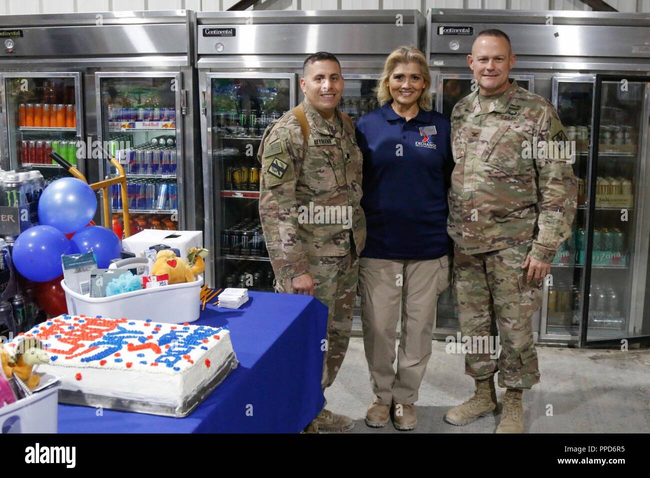 U.S. Army Col. Michael Maddox, right, Al Asad Air Base (AAAB) commander ...