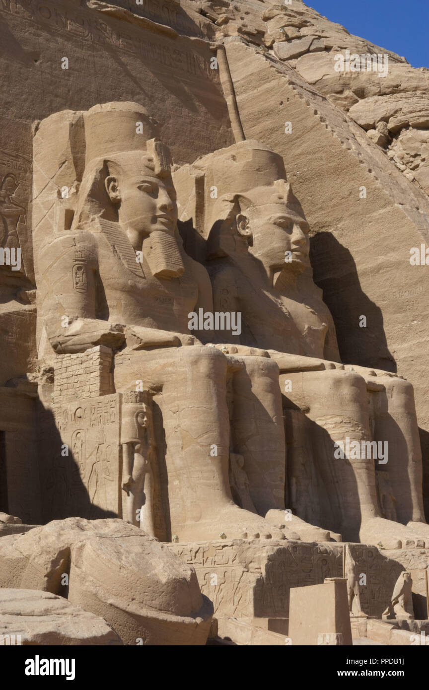 Egyptian art. Great Temple of Ramses II. Two colossal statues depicting ...