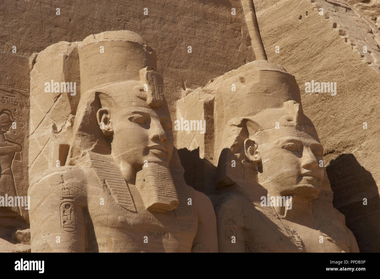 Egyptian art. Great Temple of Ramses II. Two colossal statues depicting ...