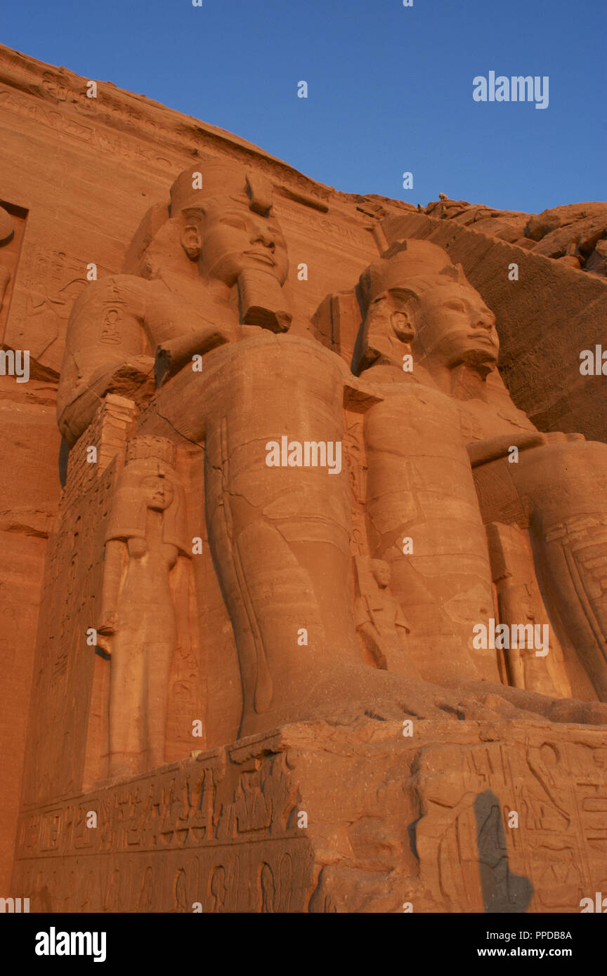 Egyptian art. Great Temple of Ramses II. Two colossal statues depicting ...