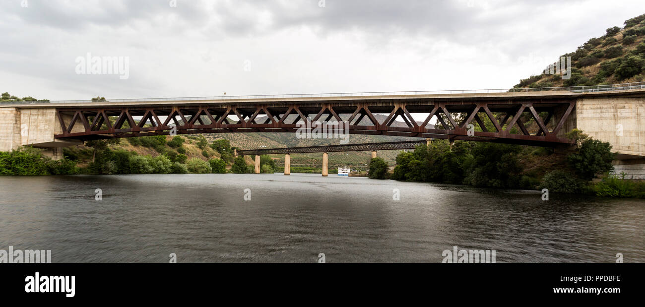 The two bridges, railway and road, over the Agueda River, near the town ...