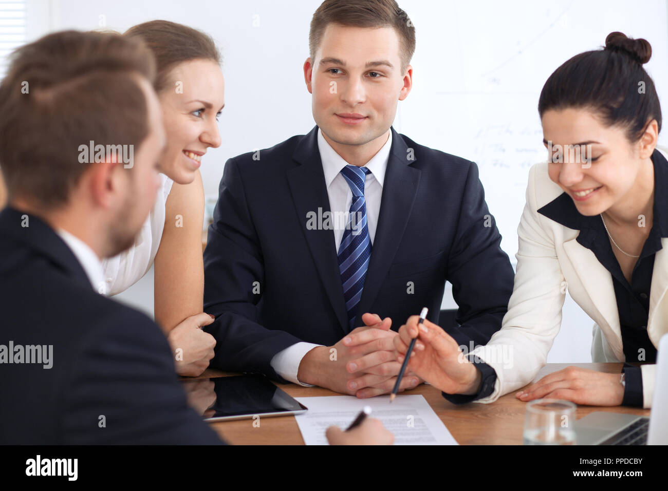 Business people at meeting in office background. Successful negotiation ...