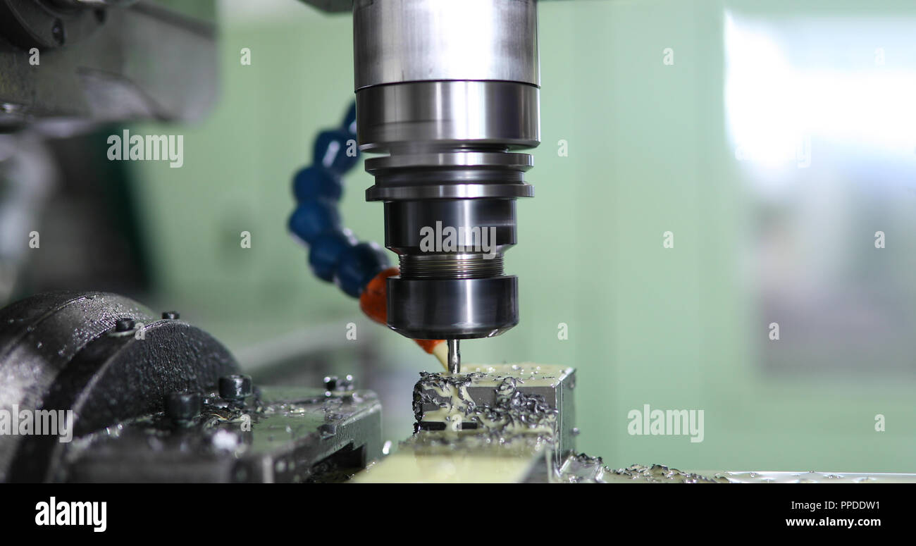 machine tool in metal factory with drilling cnc machines Stock Photo ...