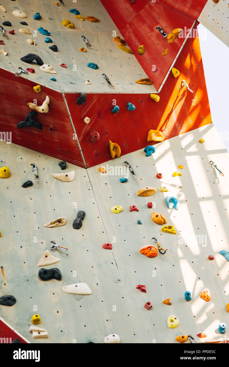 Outdoor rock climbing wall in a sport facility Stock Photo - Alamy