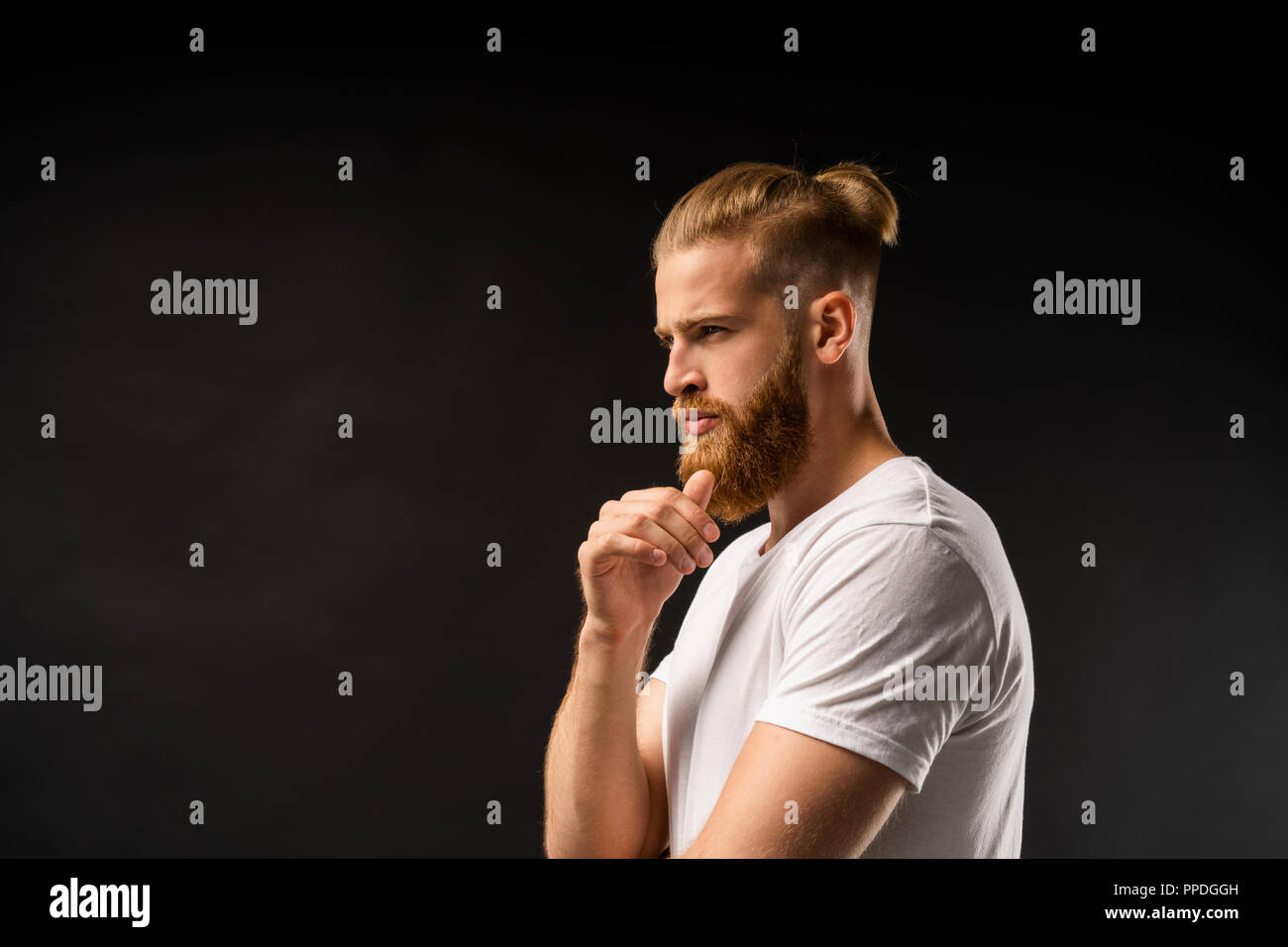 Side view portrait of thinking stylish young man looking away Stock ...