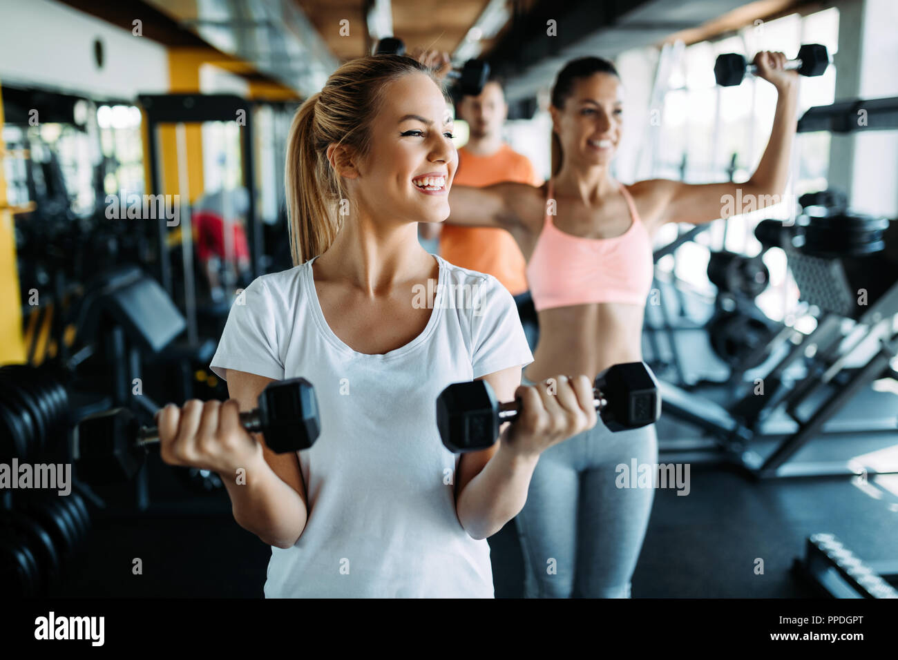Women gym machine hi-res stock photography and images - Alamy